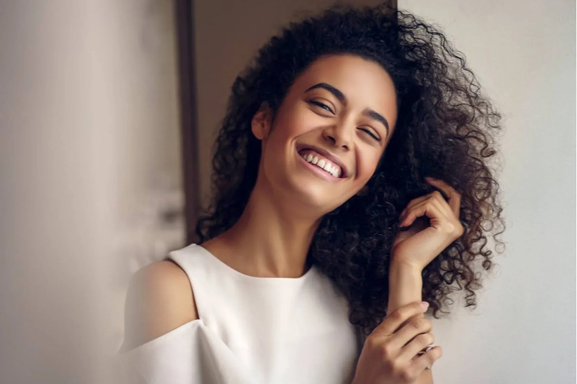 How To Scrunch Your Hair For Defined Curls – Carol's Daughter